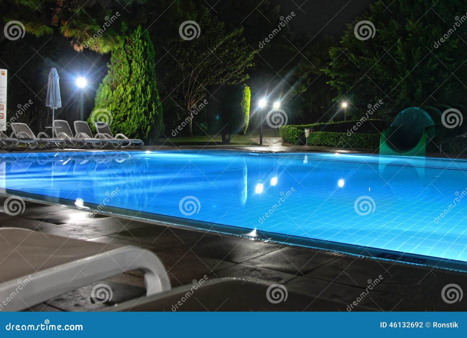 Swimming pool at night stock photo. Image of outdoor - 46132692