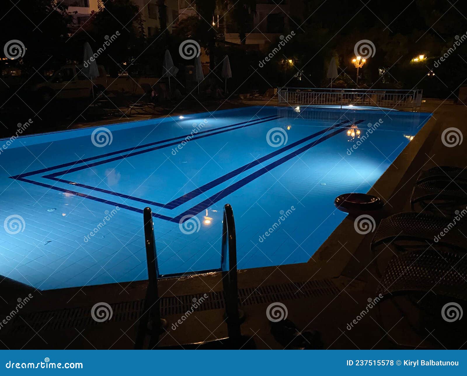 Swimming Pool at Night Time Stock Photo - Image of chair, design: 237515578