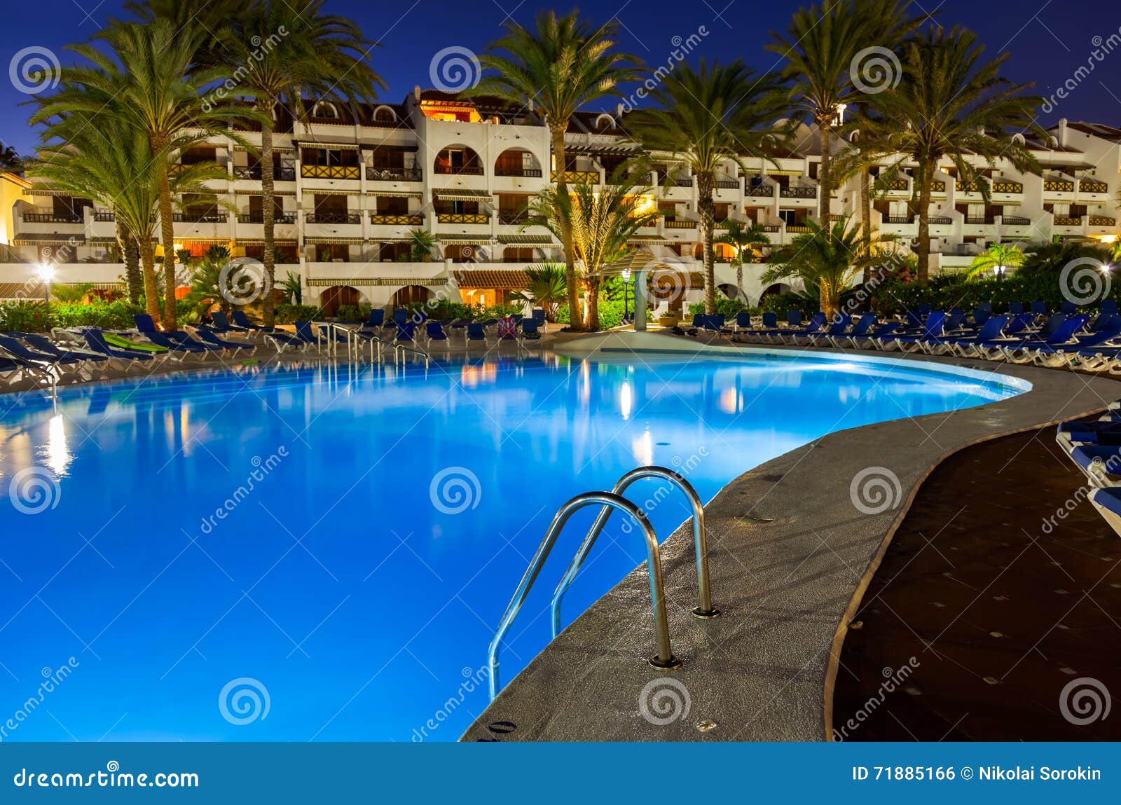 Swimming pool at night stock photo. Image of poolside - 71885166