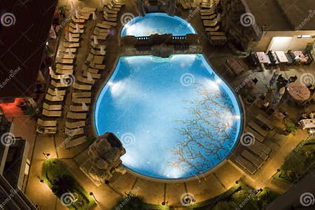 Swimming pool by night stock image. Image of tables, complex - 35525245