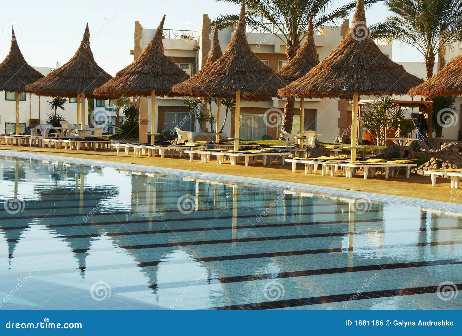 Swimming-pool and parasols stock photo. Image of beauty - 1881186