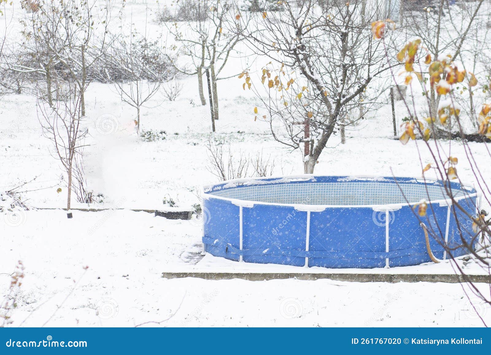 Swimming Pool on a Private Plot in Winter Under the Snow. Pool Storage ...