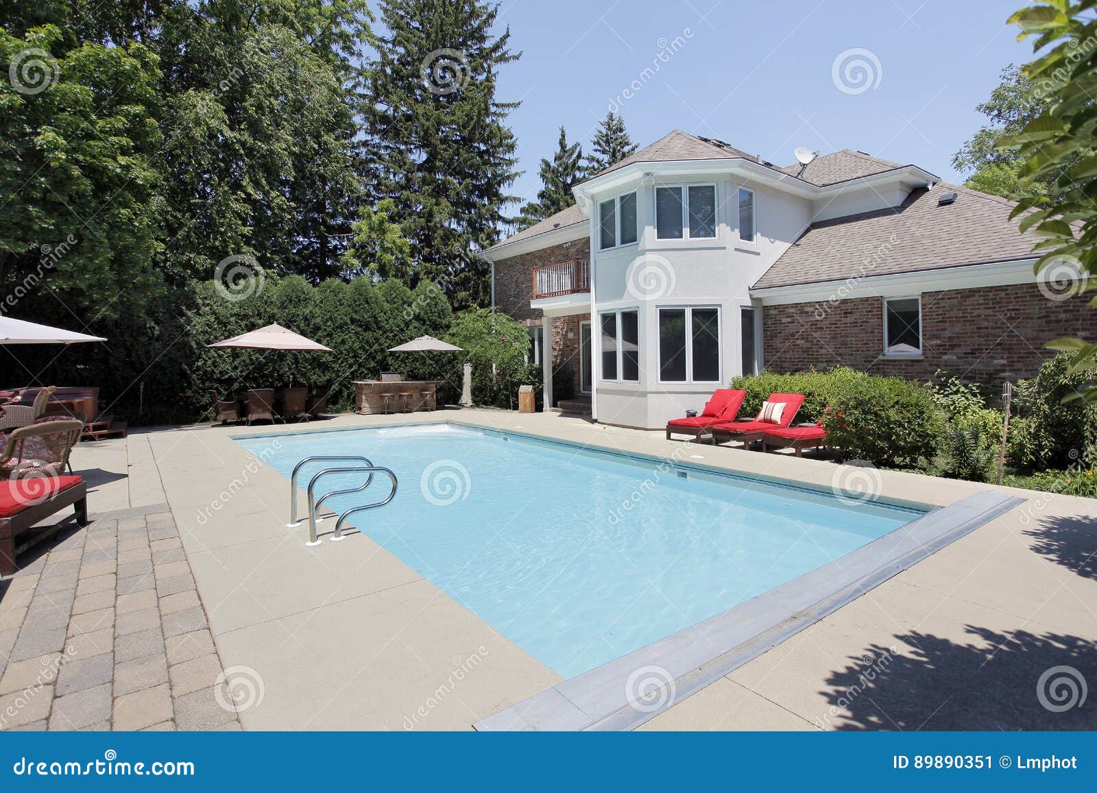 Swimming Pool with Red Lounge Chairs Stock Image - Image of single ...