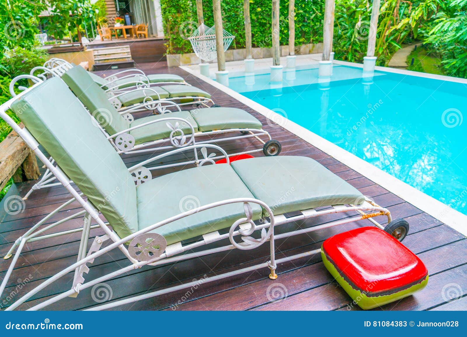Swimming Pool with Relaxing Seats . Stock Image - Image of housing ...
