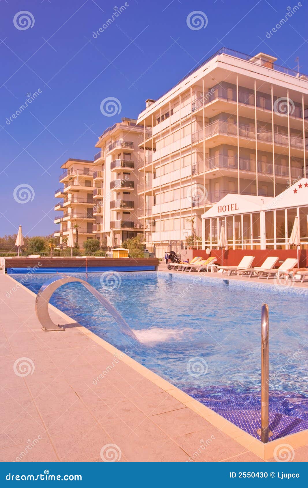 Swimming pool in a resort stock photo. Image of swimming - 2550430
