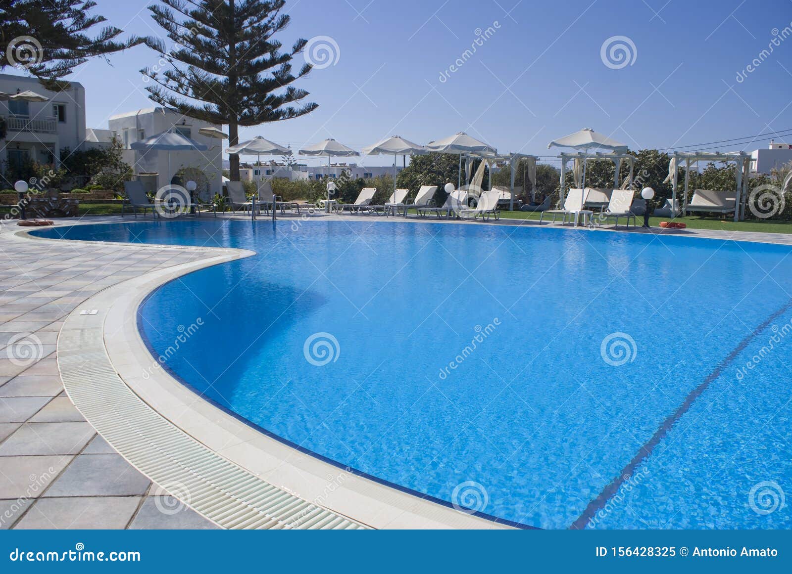 Swimming pool of a resort stock image. Image of summer - 156428325