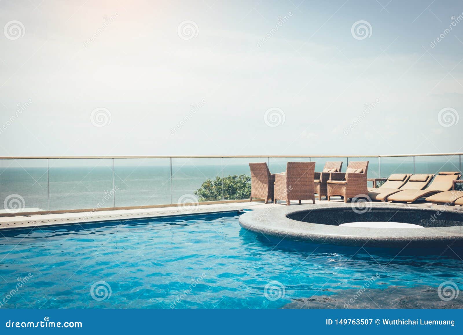 Swimming pool with seaview stock image. Image of mattress - 149763507