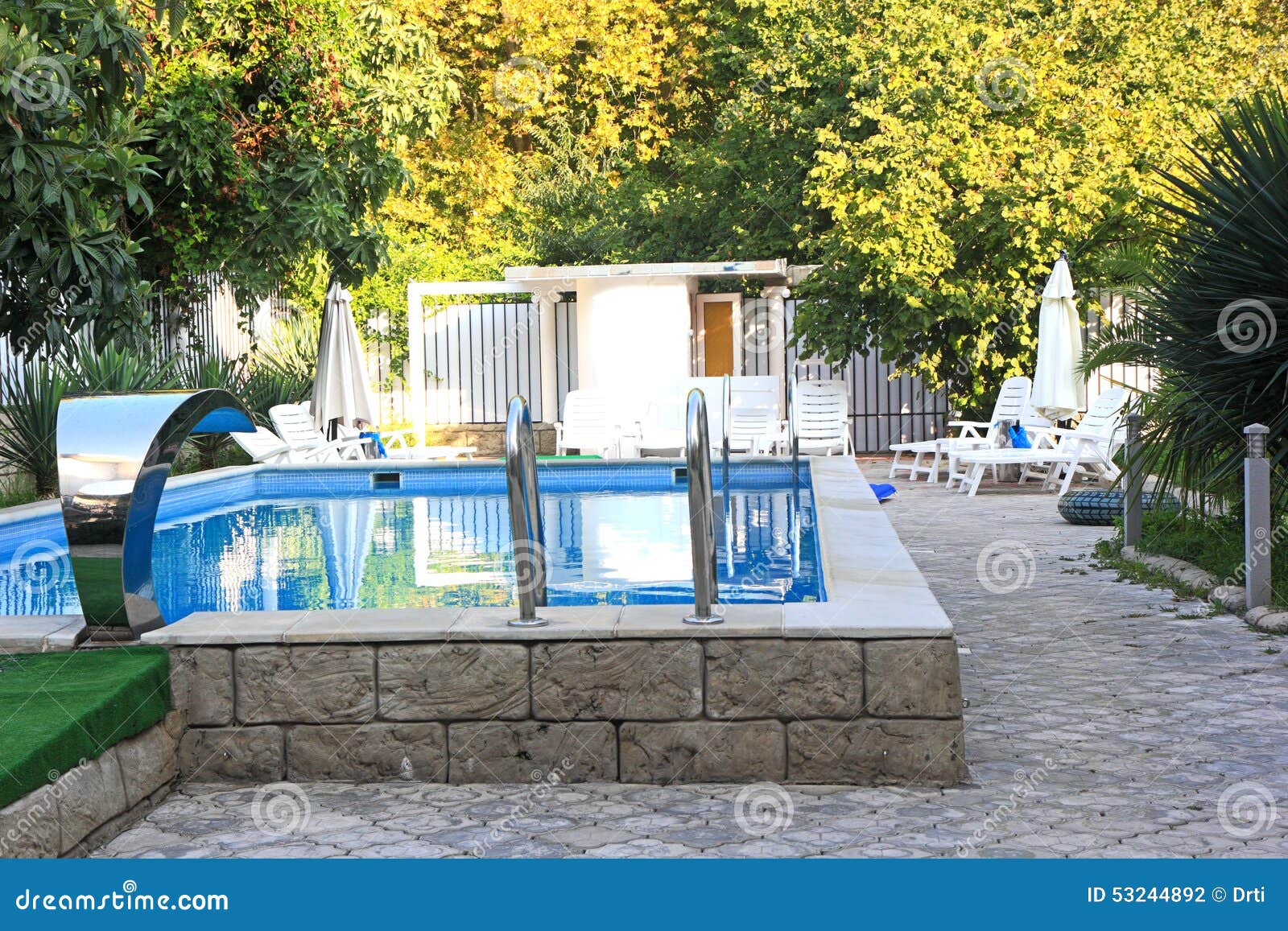 Swimming Pool and a Small Seating Area Stock Photo - Image of activity ...