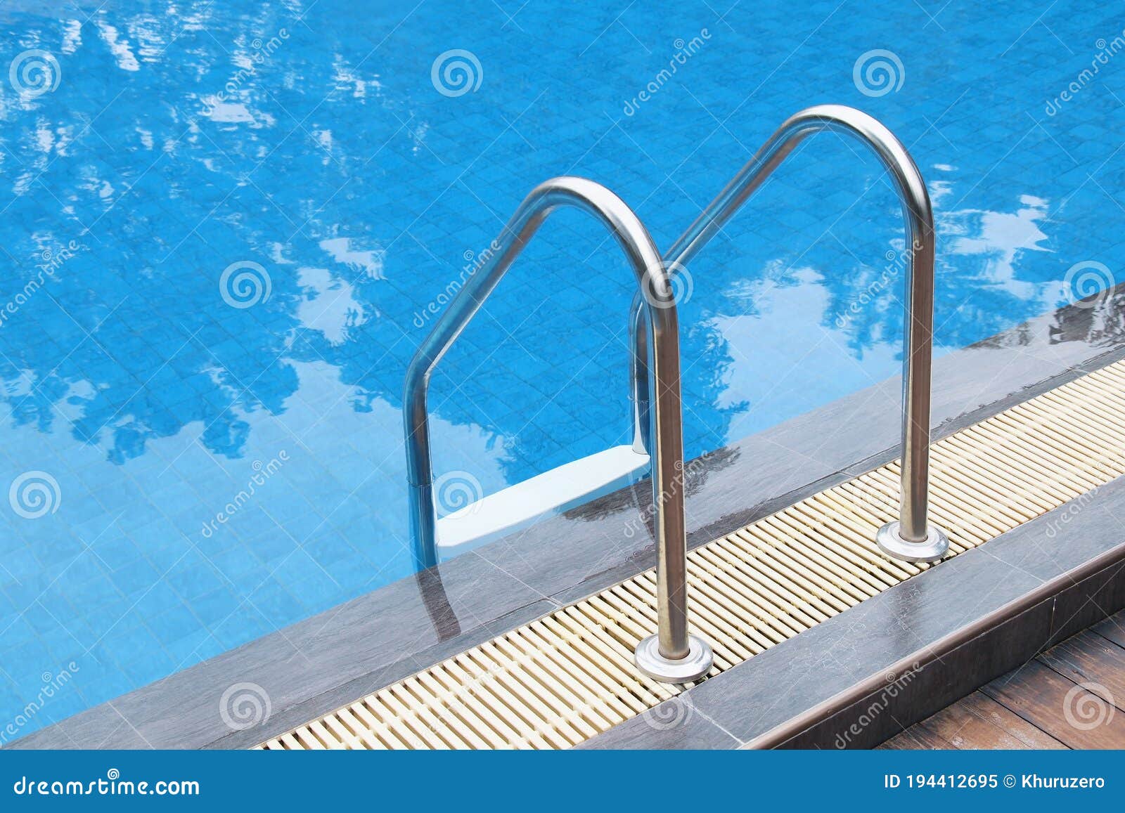 Swimming pool with stair stock image. Image of grab - 194412695