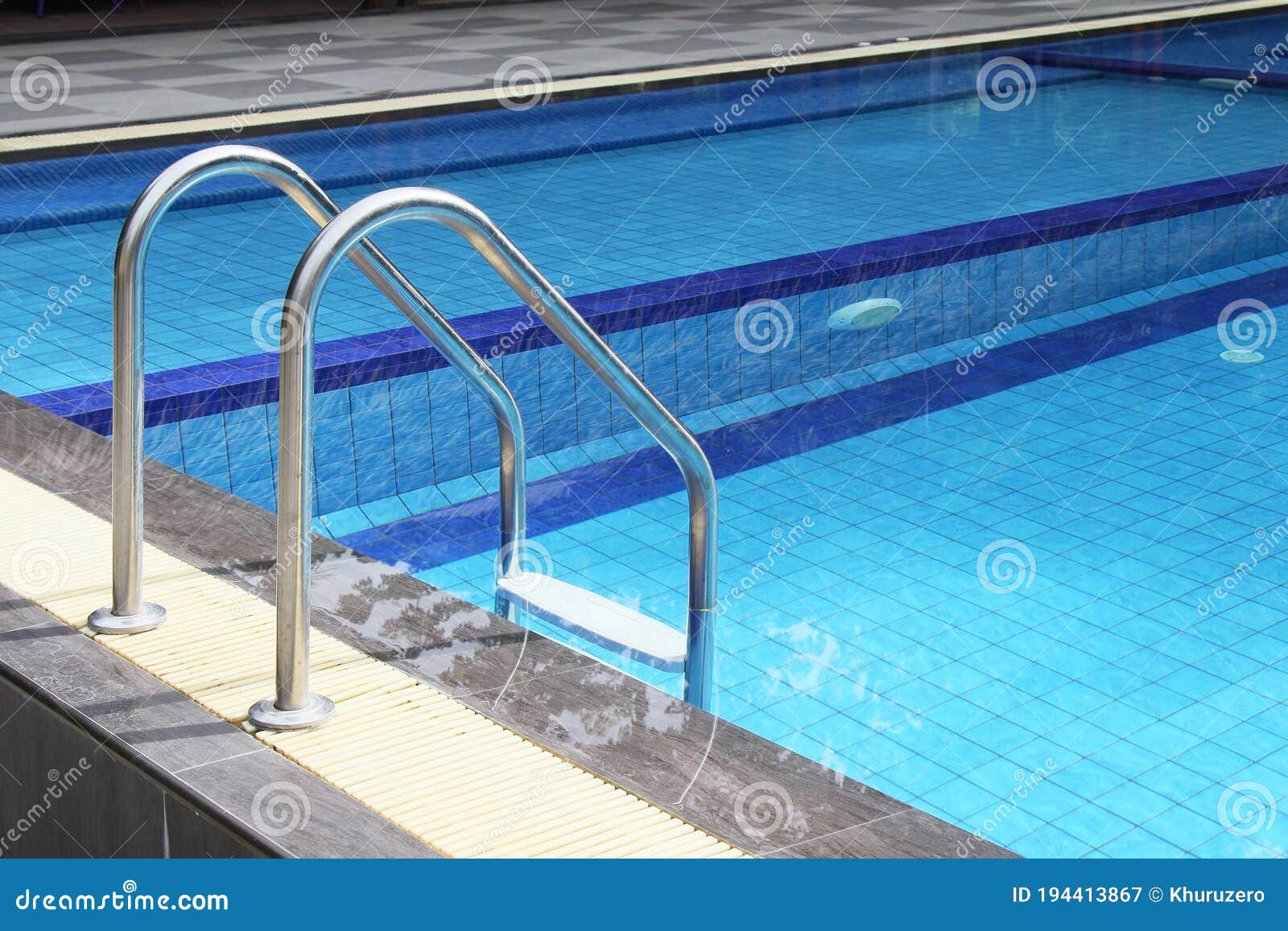 Swimming pool with stair stock image. Image of grab - 194413867