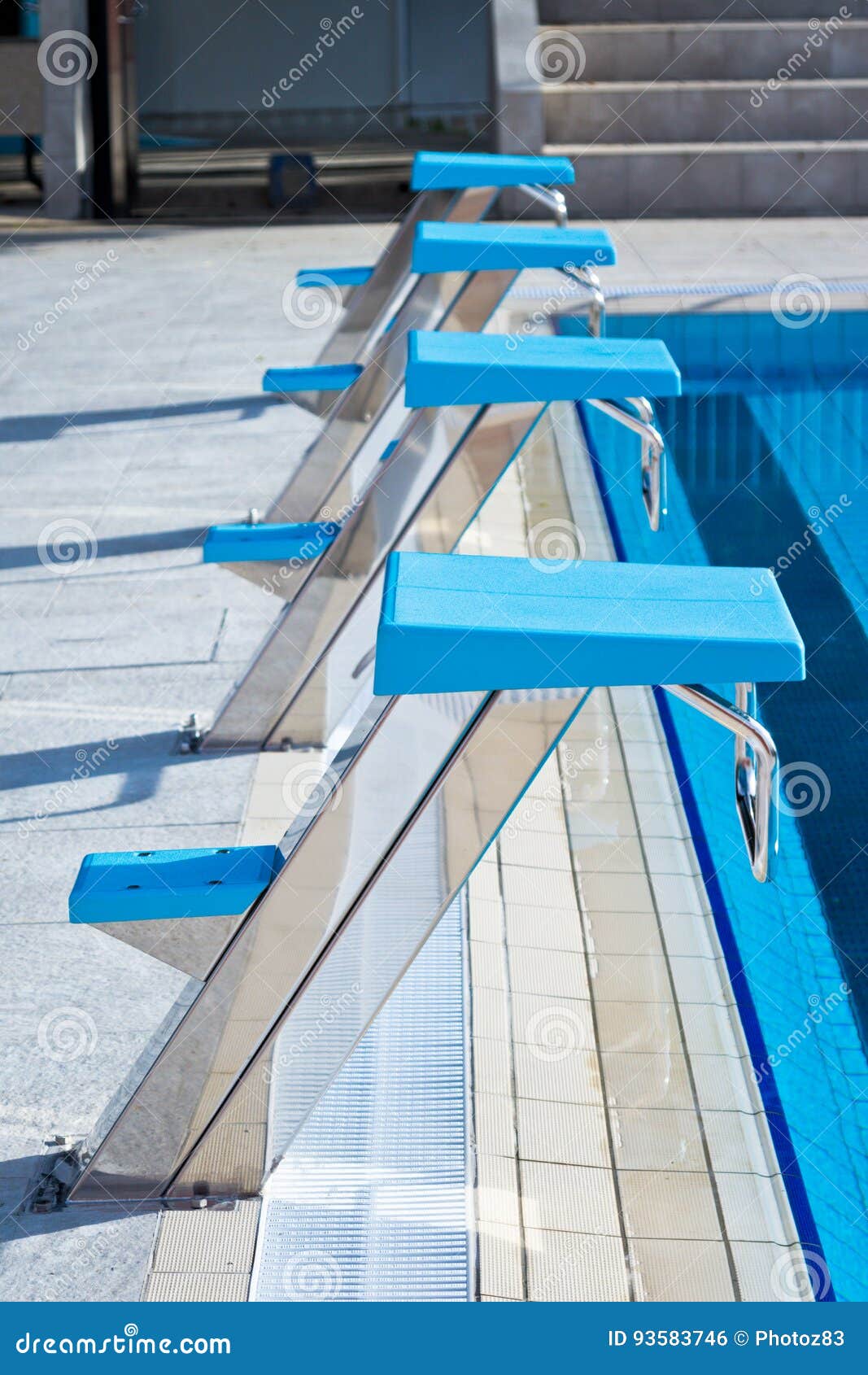 Swimming Pool Starting Blocks in a Row Stock Photo - Image of start ...