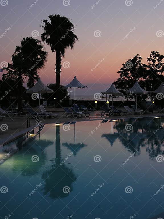 Swimming pool at sunset stock image. Image of swimm, asia - 105355