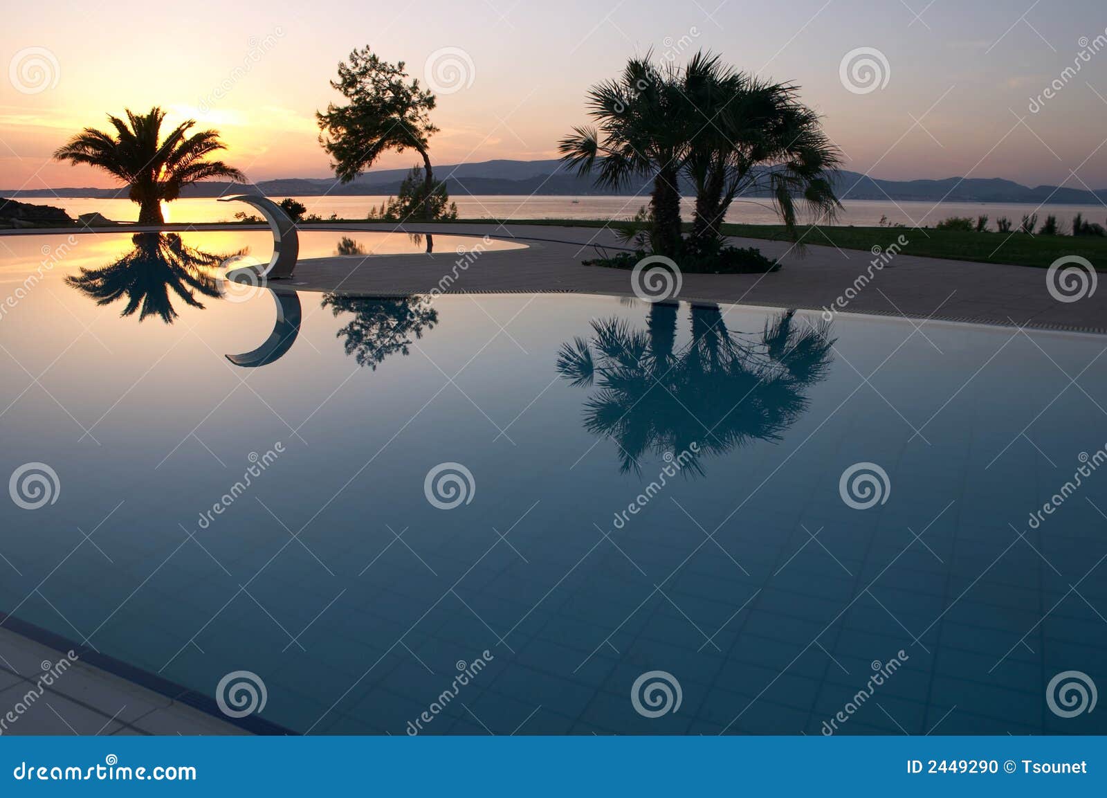 Swimming pool sunset stock photo. Image of island, greek - 2449290