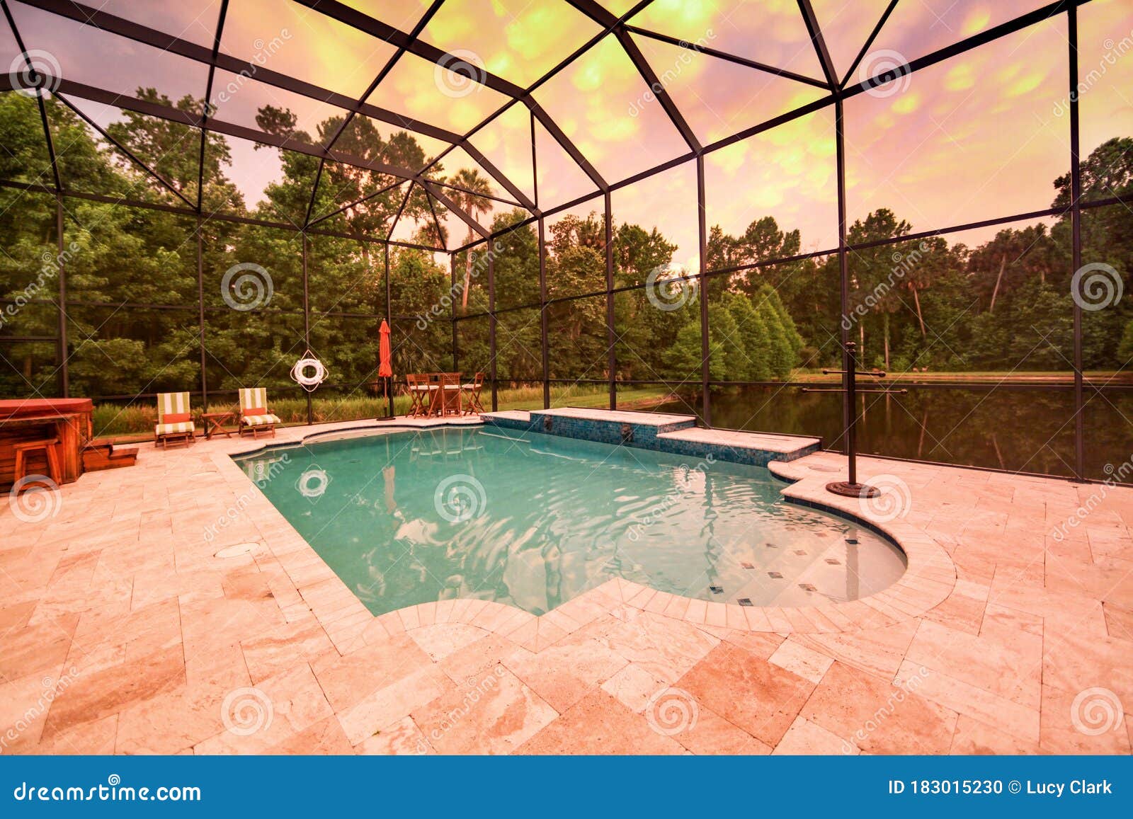 Swimming Pool at Sunset stock photo. Image of sunset - 183015230