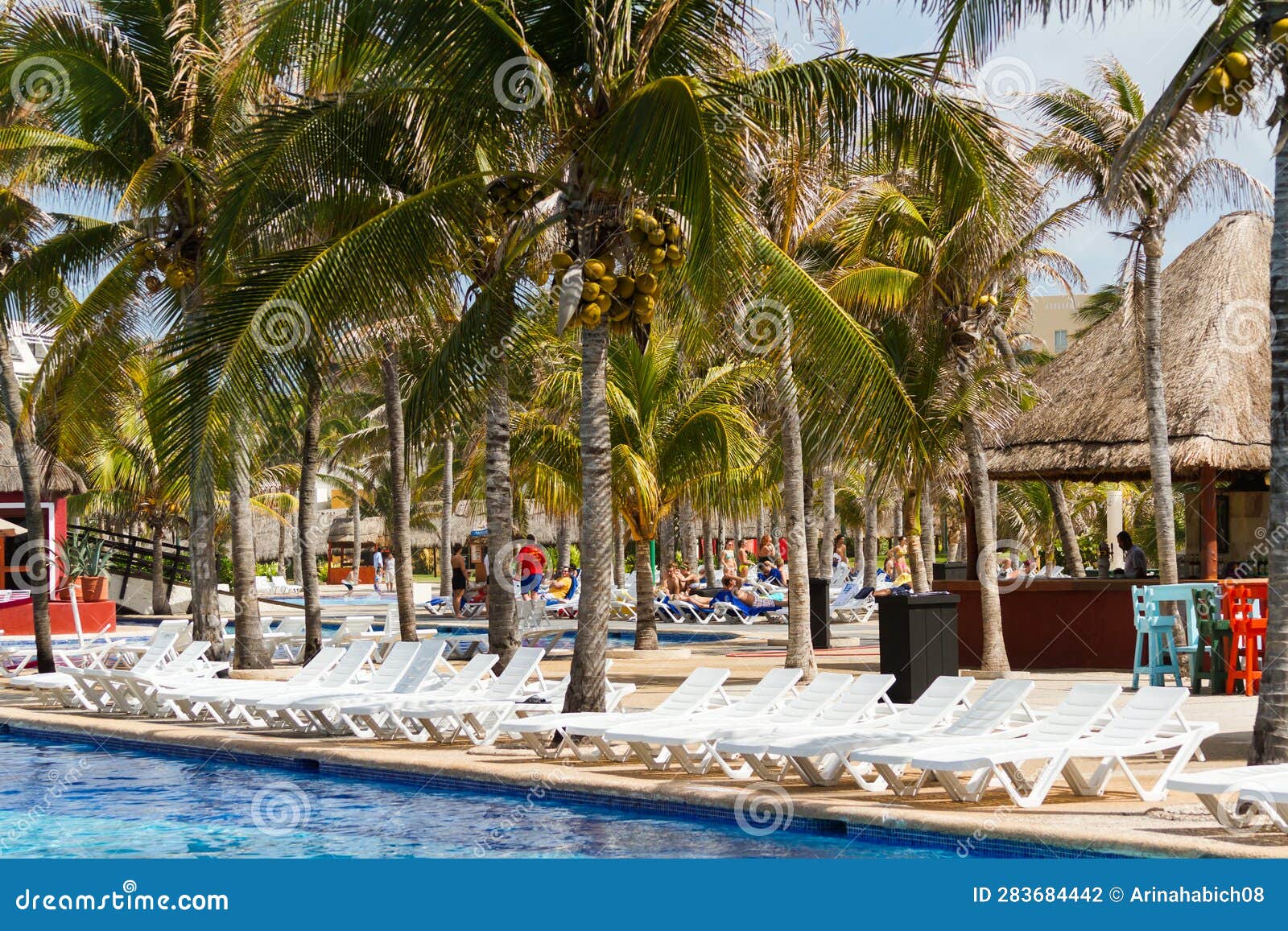 Swimming pool editorial photography. Image of cancun - 283684442