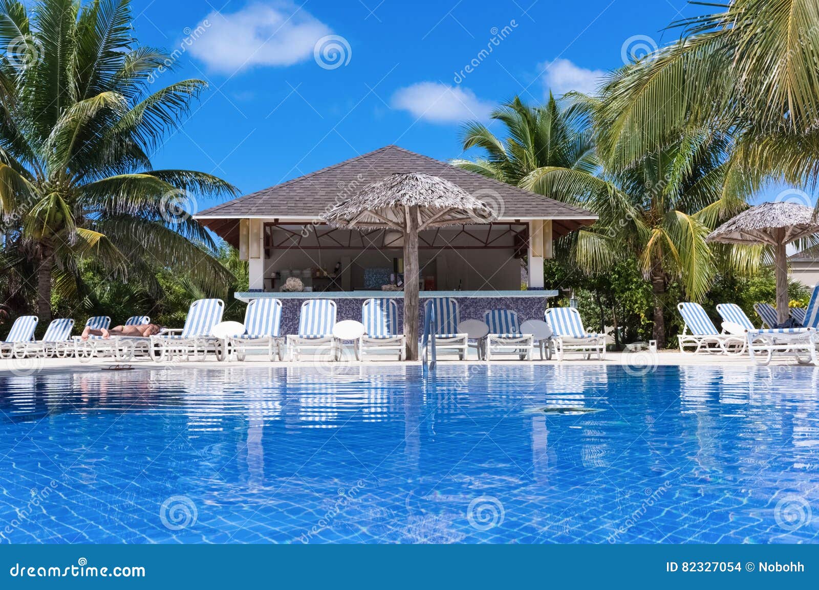 Swimming Pool View with Sun Lounger and a Bar in Cuba Stock Photo ...