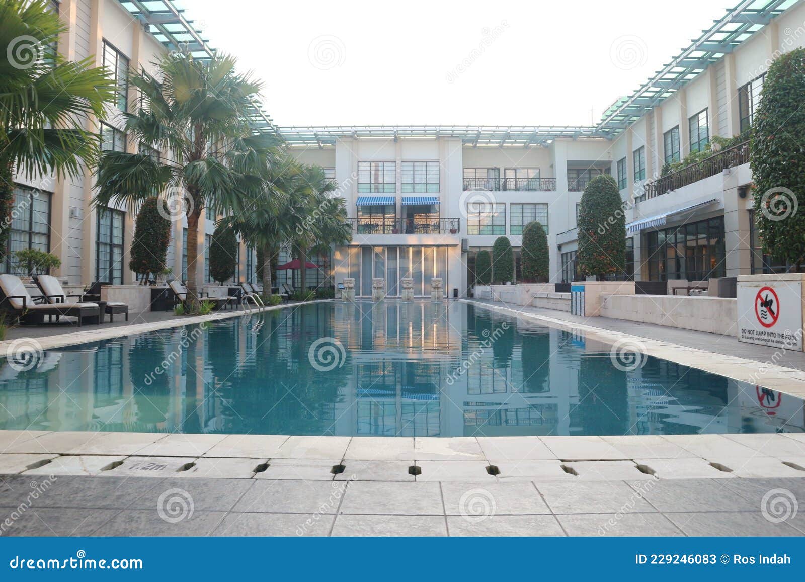 Swimming pool view editorial stock photo. Image of fountain - 229246083