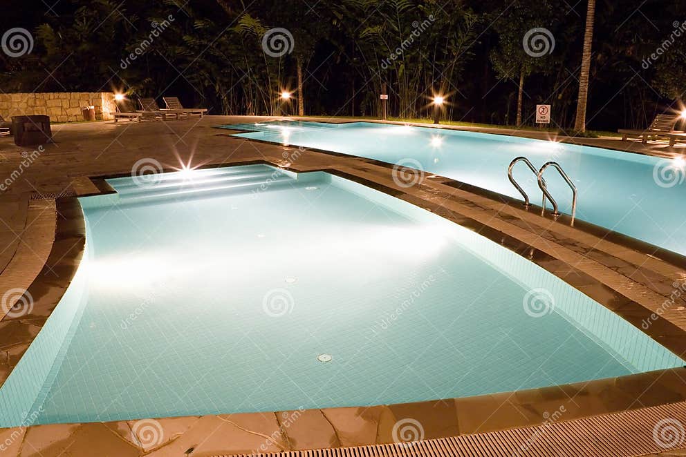 Swimming Pools at Night stock image. Image of pool, aqua - 5011761