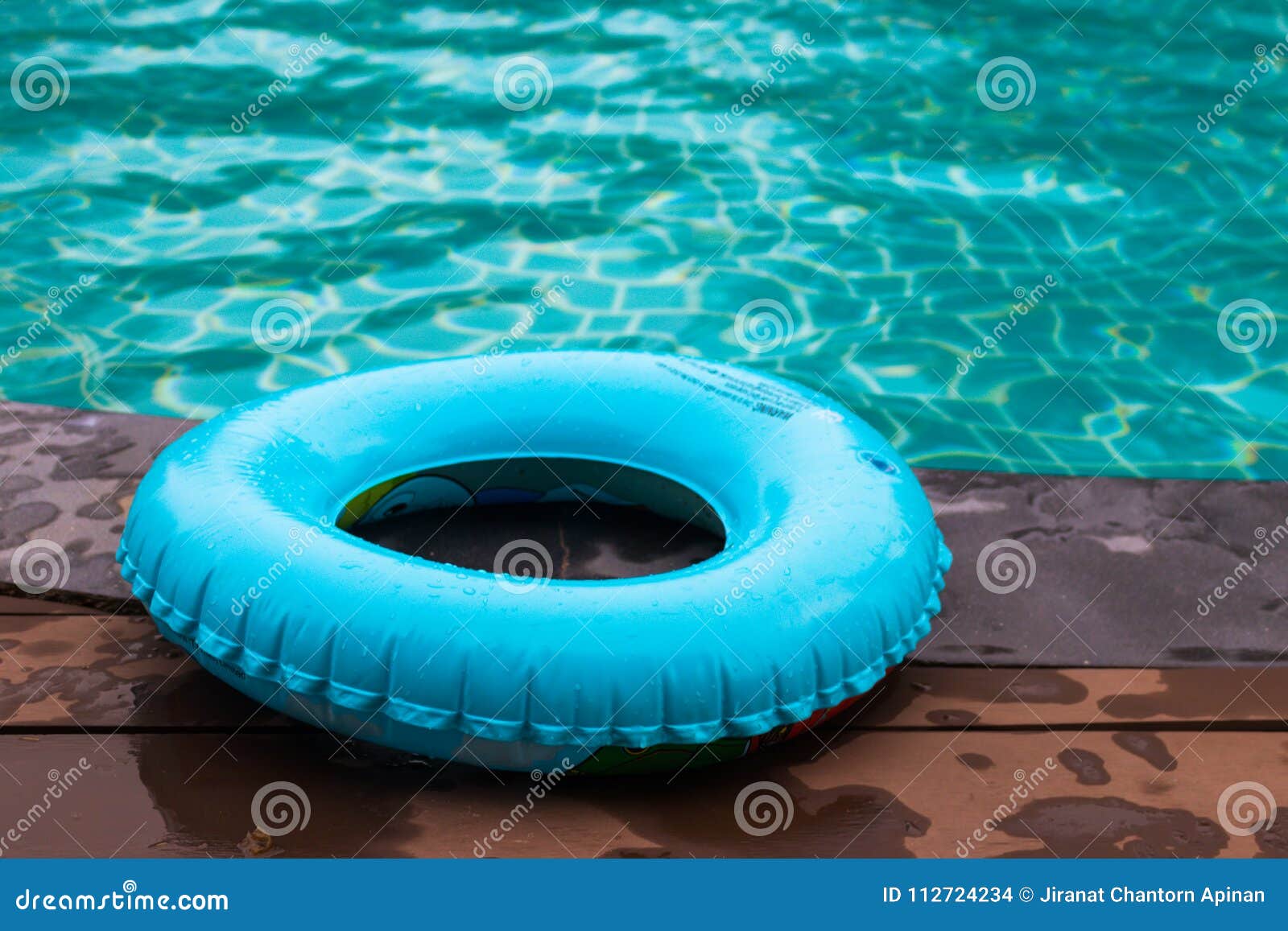 Swimming Rubber Ring on the Wood Walkway Stock Photo - Image of relax ...