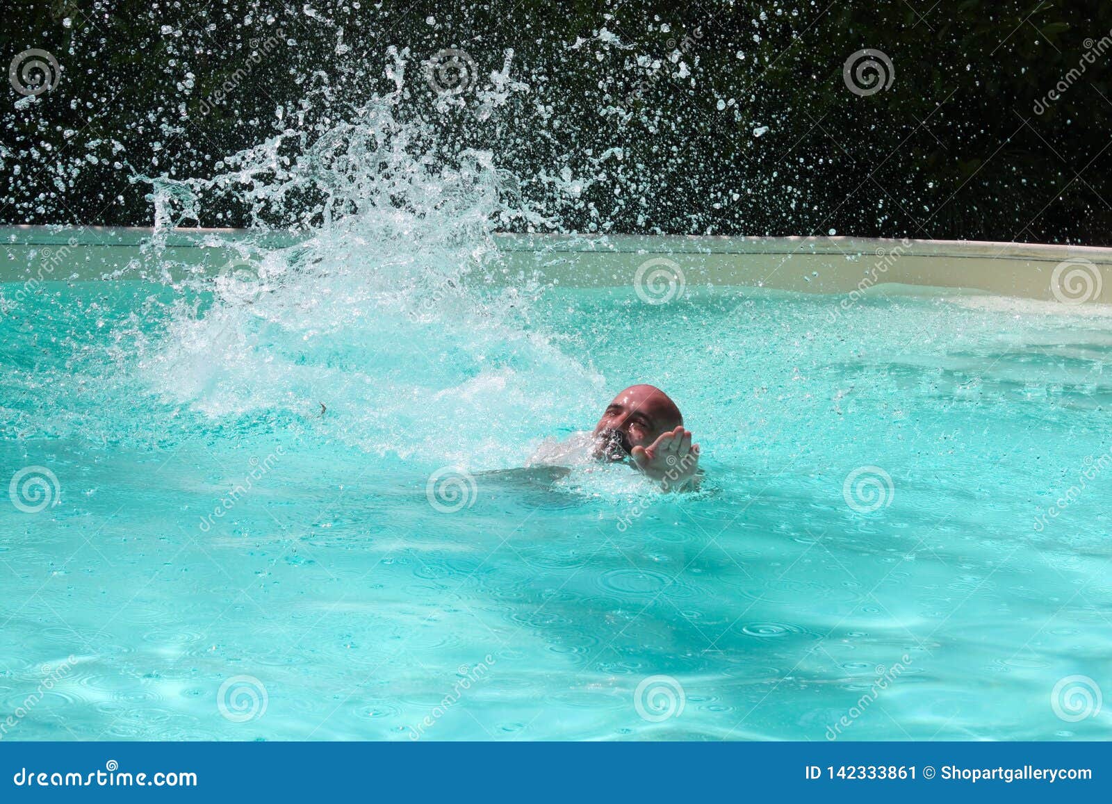 Swimming with Water Splash stock image. Image of bright - 142333861
