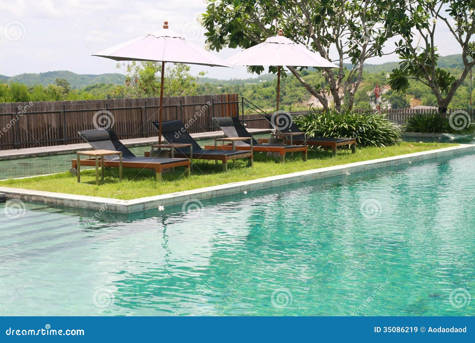 Swimmingpool stock image. Image of sunlounger, blue, sunshade - 35086219