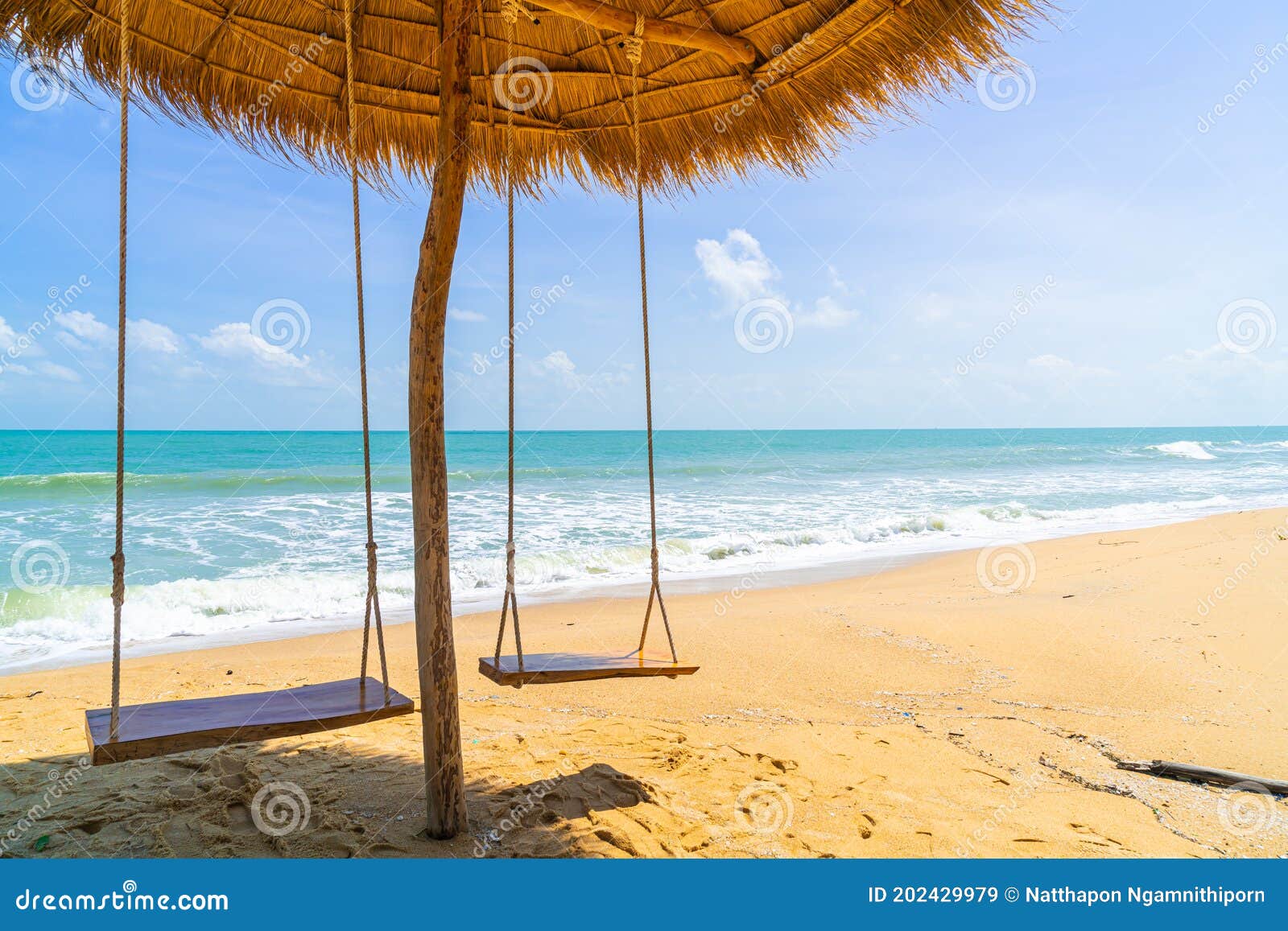 Swing on Beach with Ocean Sea Background Stock Image - Image of scenic ...