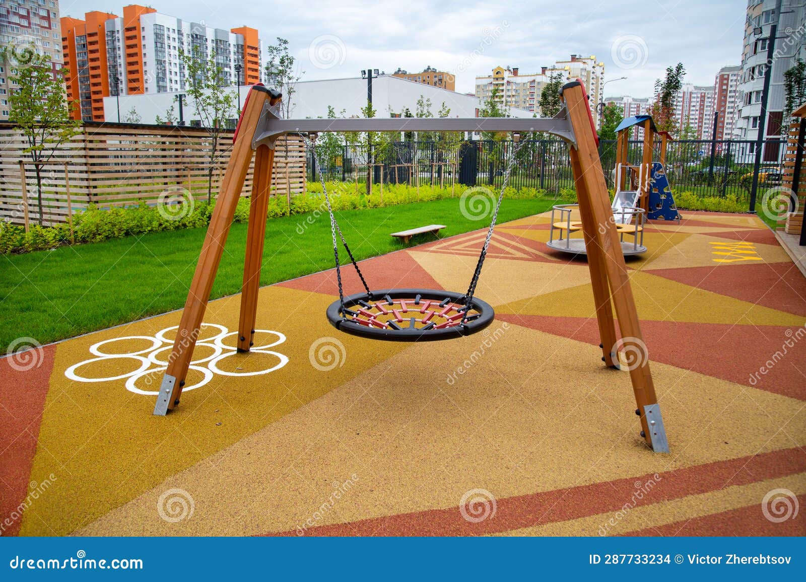 Swing on a Beautiful Rubberized Covering in the Form of Triangles on ...