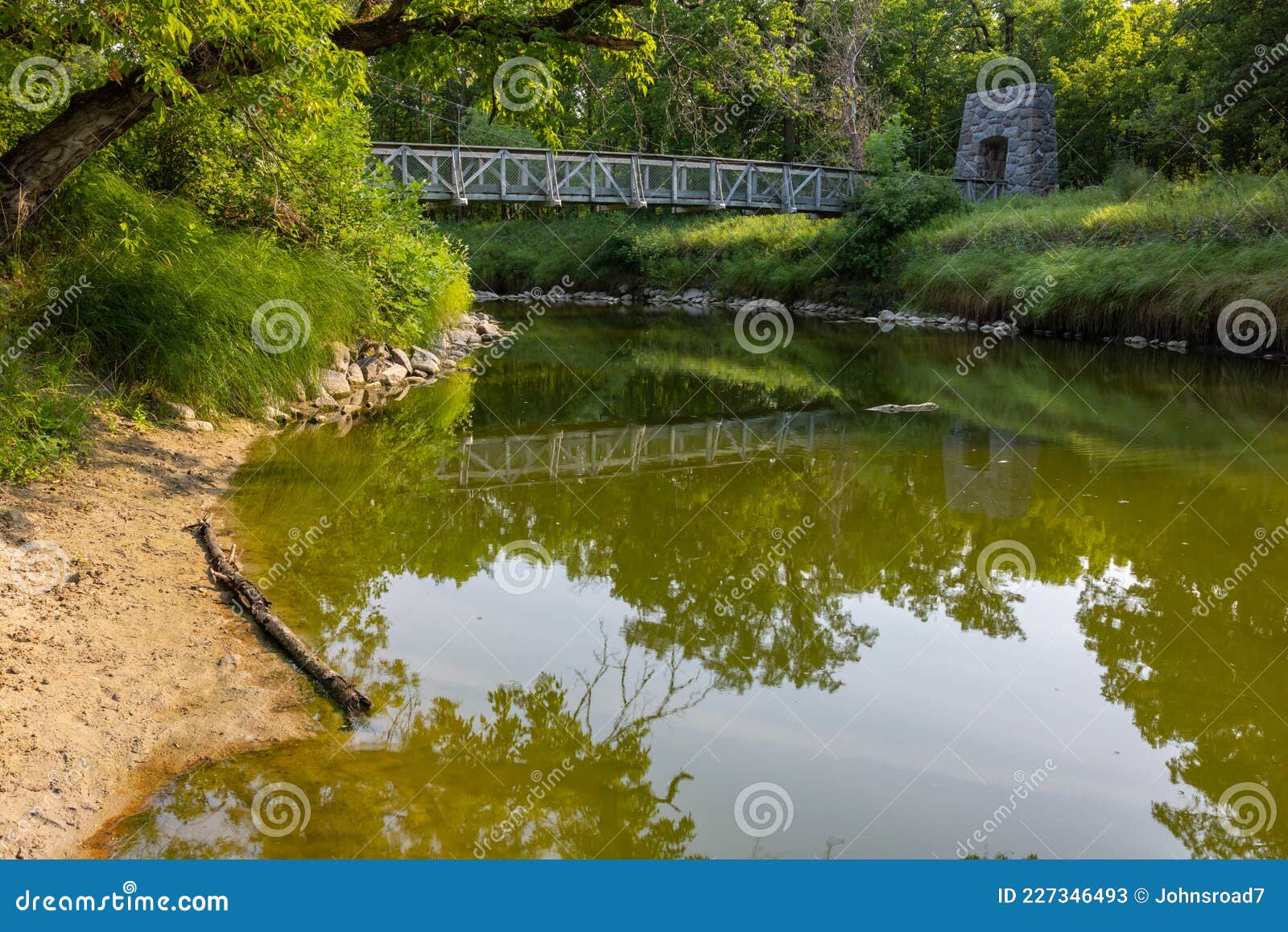 Swing Bridge Over River in the Woods Stock Image - Image of trees ...