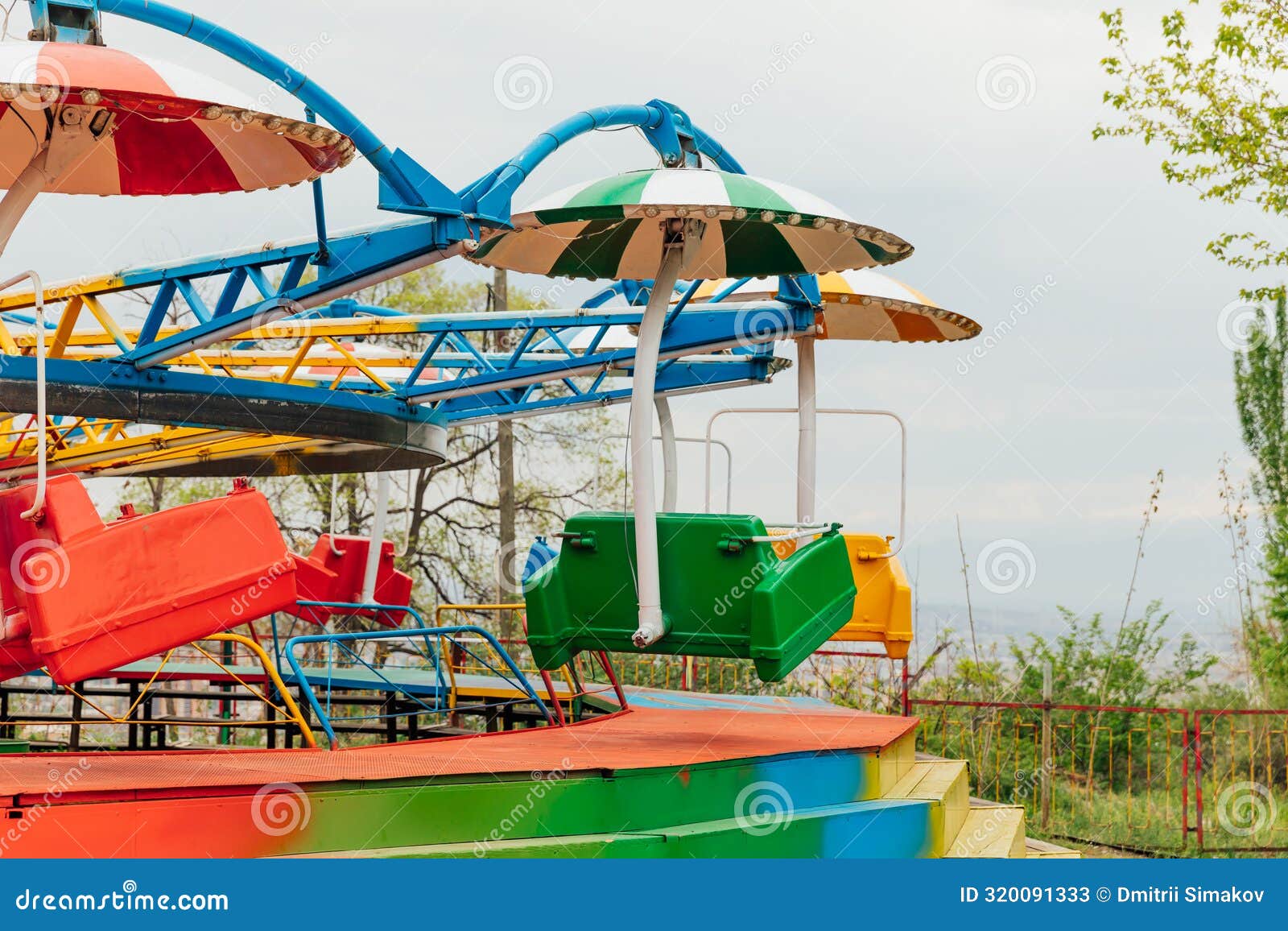 Swing Carousel Attractions in the Amusement Park Stock Image - Image of ...