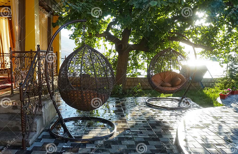 A Swing Made of Wire in the Yard Stock Photo - Image of swinging ...