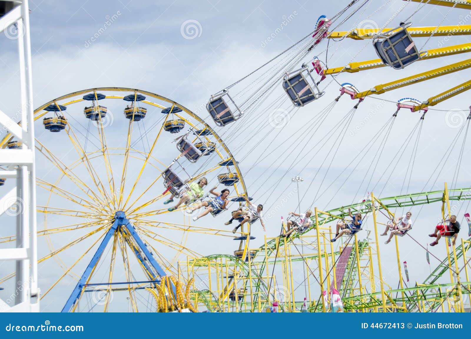 Swing ride at fair editorial stock photo. Image of amusement - 44672413