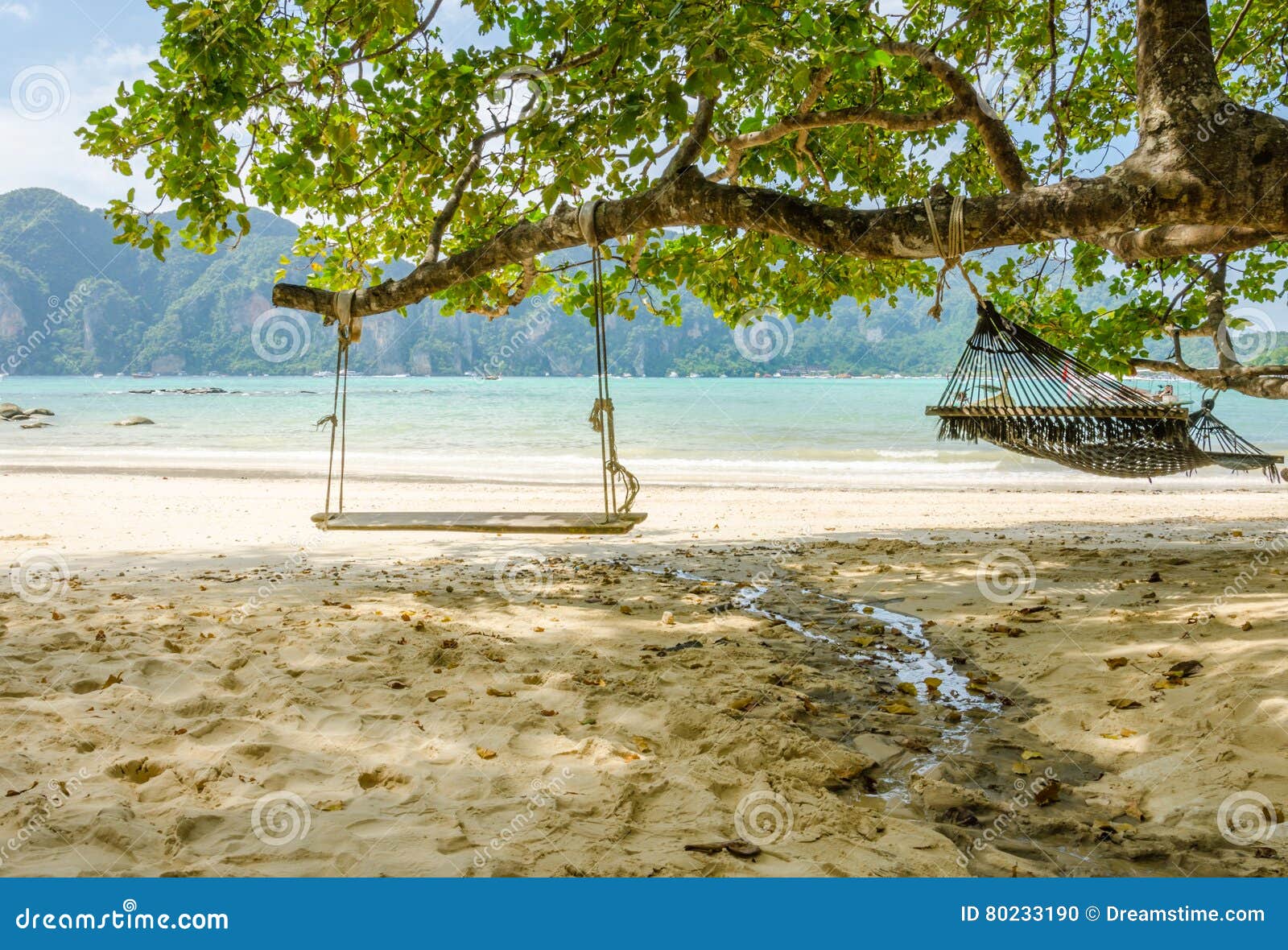 Swing Set and Hammock on the Beach Ocean View Stock Photo - Image of ...