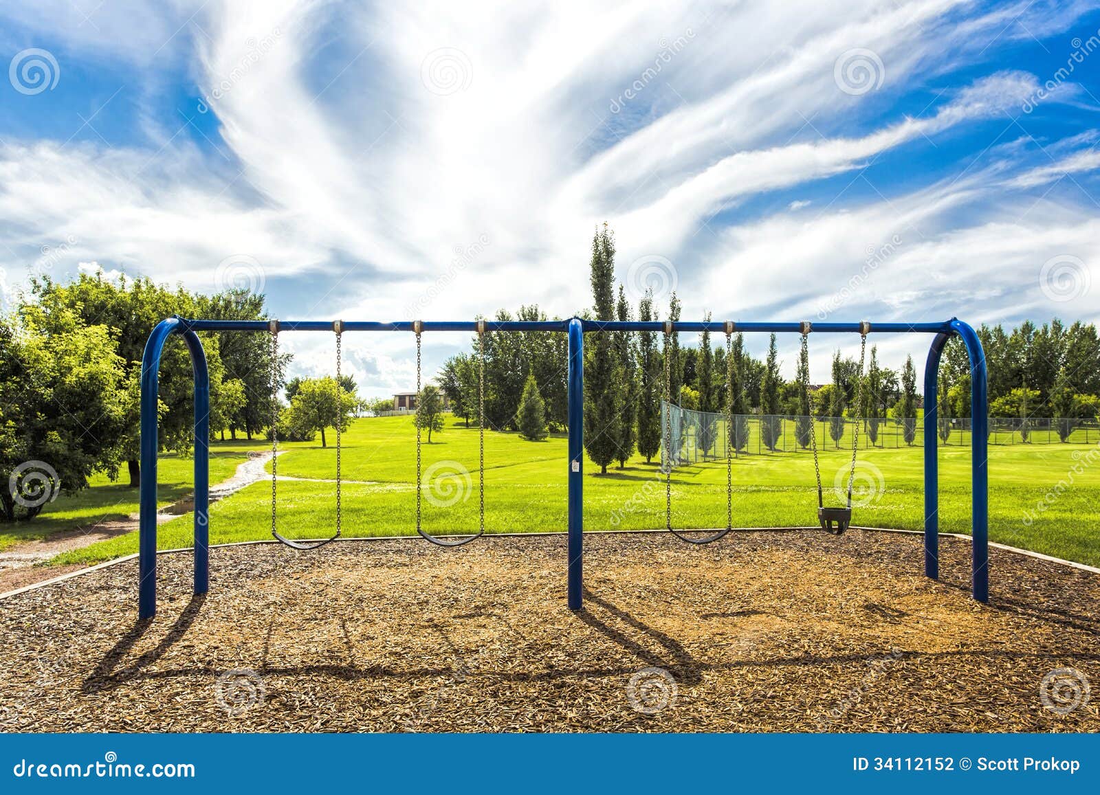 Swing Set in the Park stock photo. Image of summer, grass - 34112152