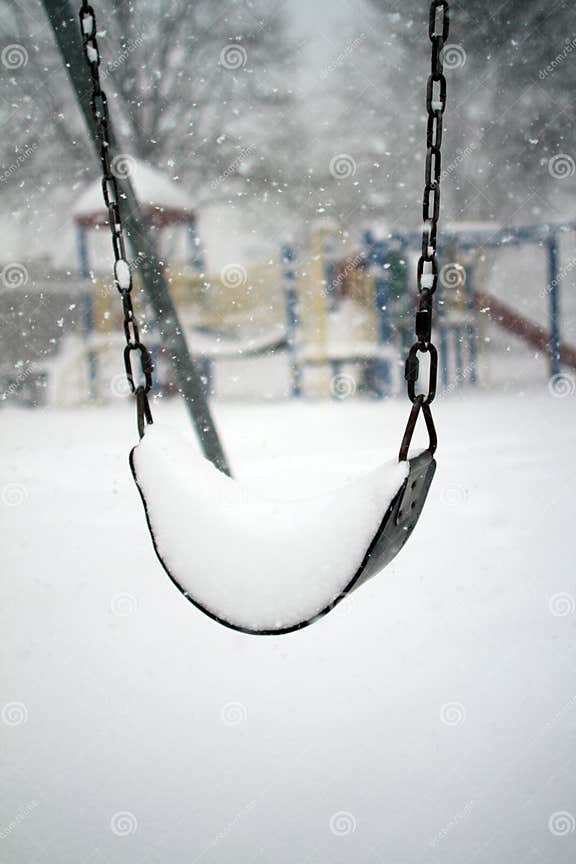 Swing in a snow storm stock photo. Image of swing, swings - 17727536