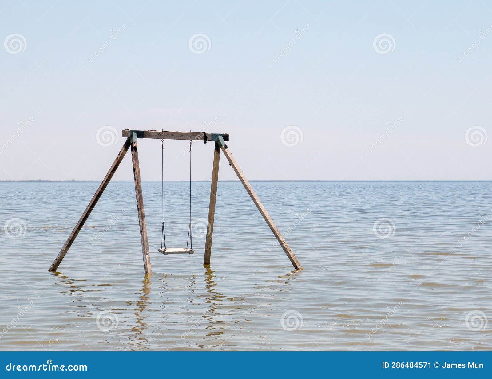 Swing in the Water of a Calm Lake Stock Image - Image of lake, line ...