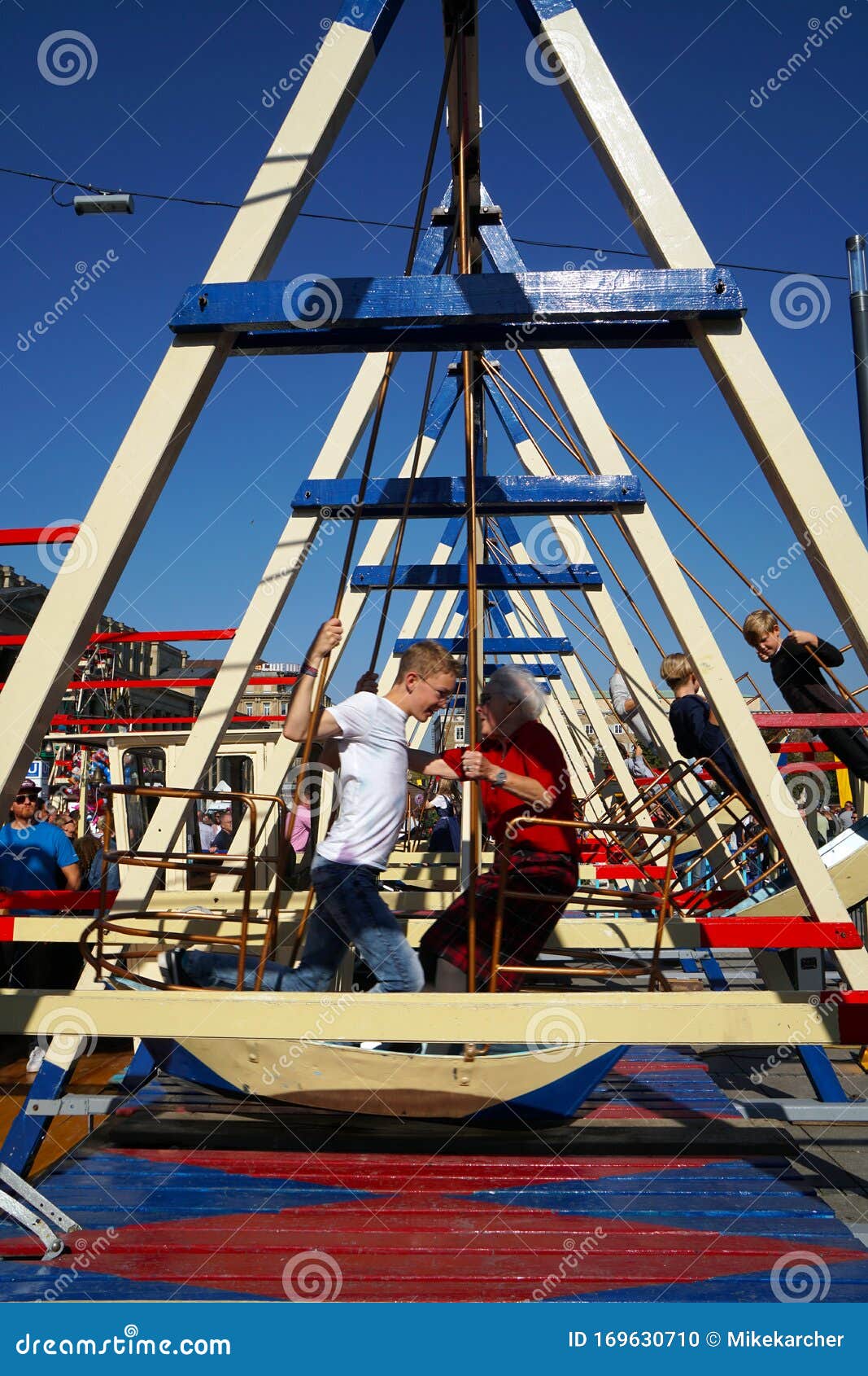 Swingboat editorial image. Image of lederhosen, attraction - 169630710