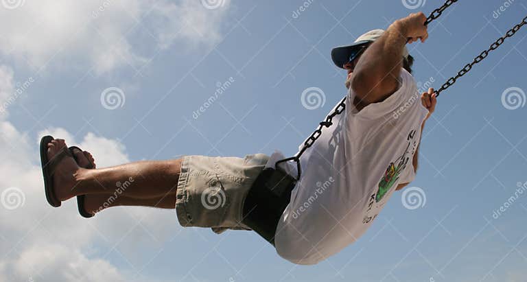 Swinging stock photo. Image of swing, active, clouds, outdoors - 225872