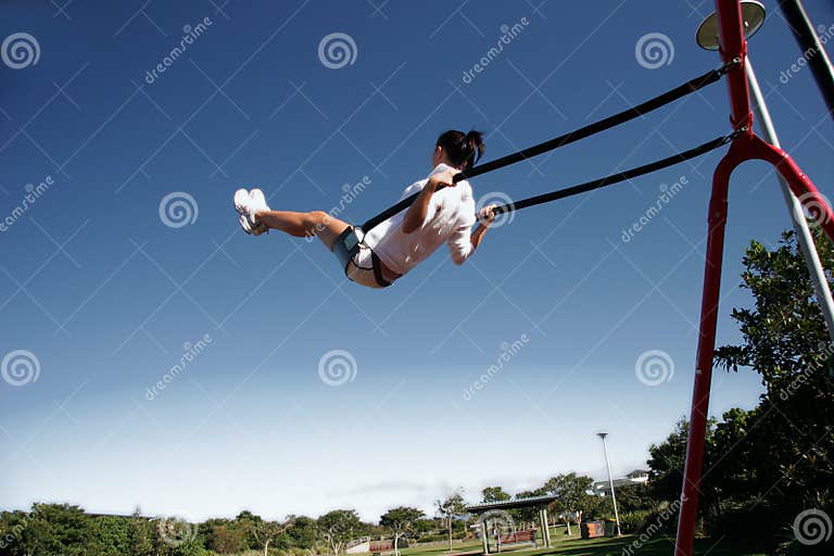 Swinging High stock image. Image of park, playground, swing - 127791