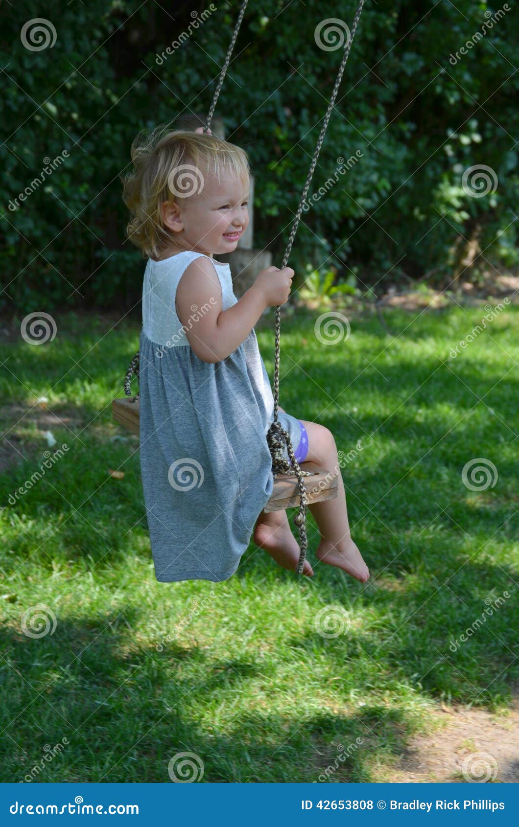 Swinging stock photo. Image of toddler, garden, child - 42653808