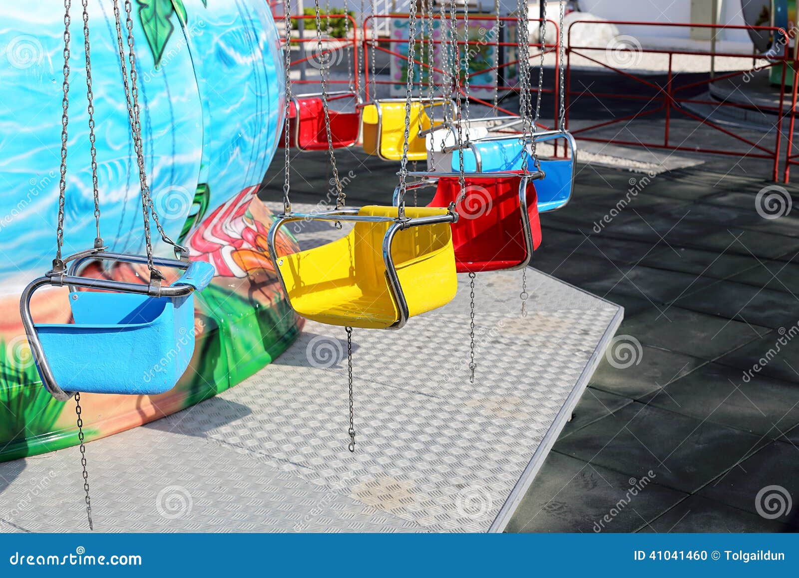Swings in Amusement Park stock photo. Image of ride, moving - 41041460