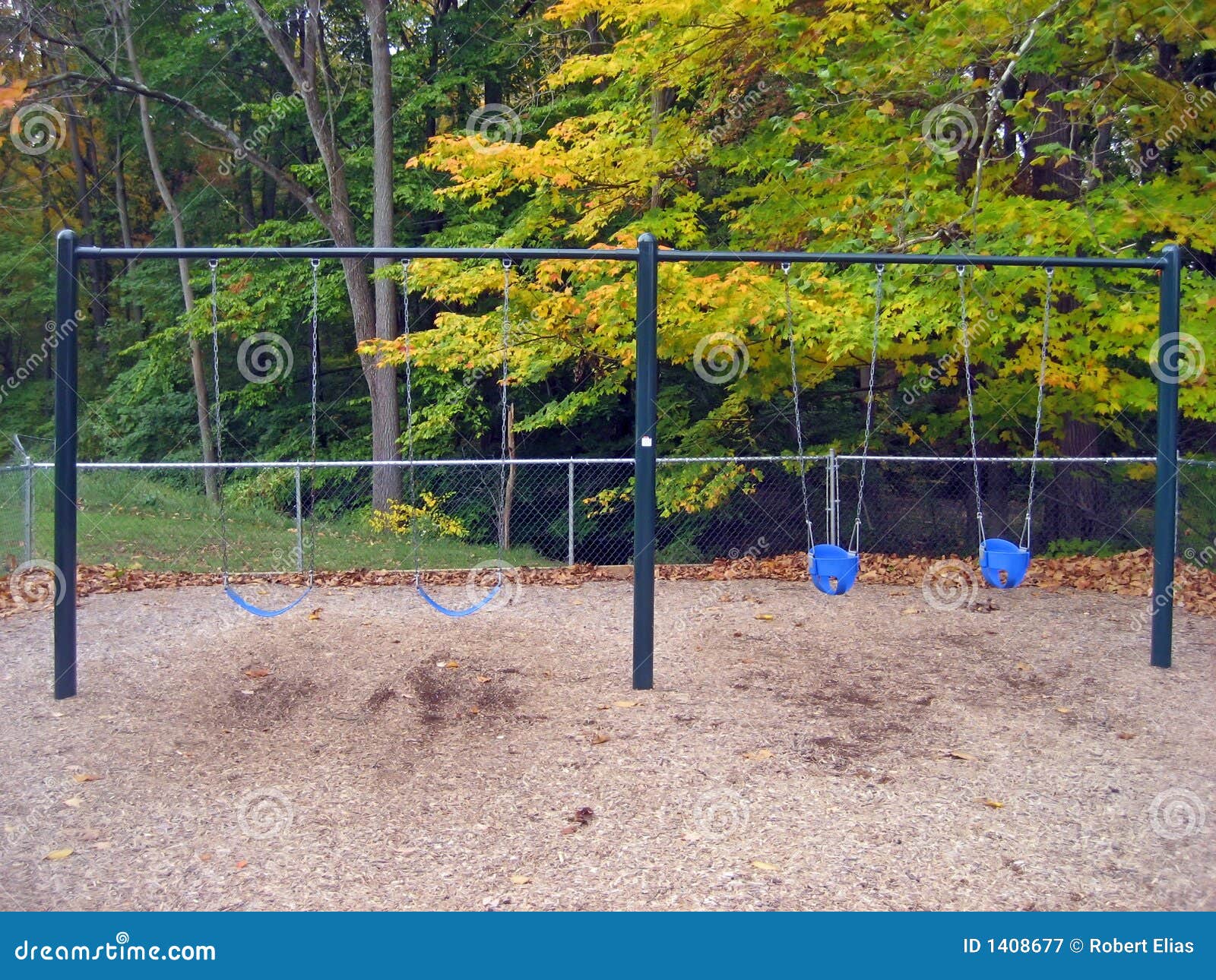 Swingset in Autumn stock image. Image of park, colorful - 1408677