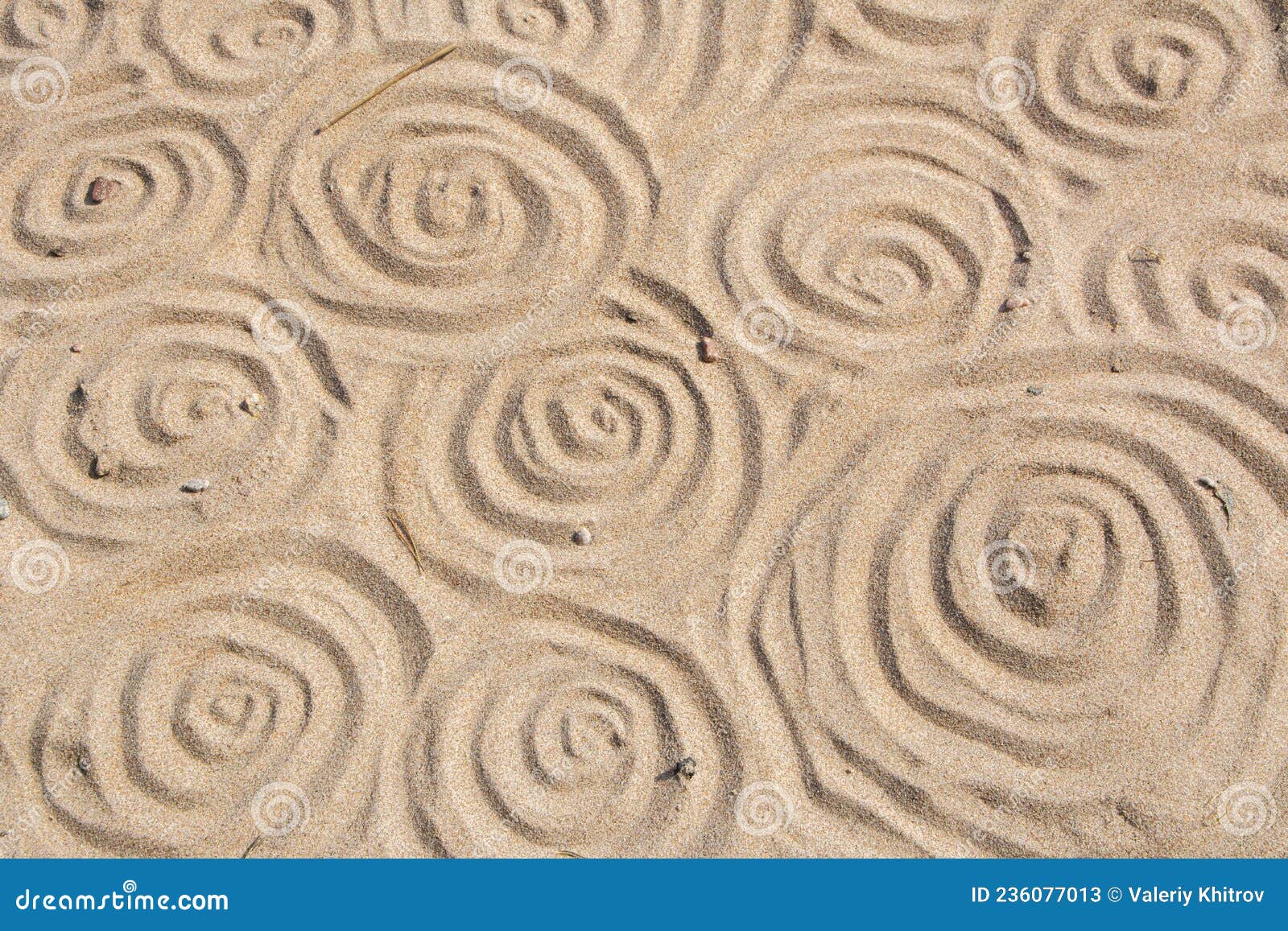 Swirl Pattern on the Sand. Hand Drawn Swirls on the Sandy Beach Stock ...