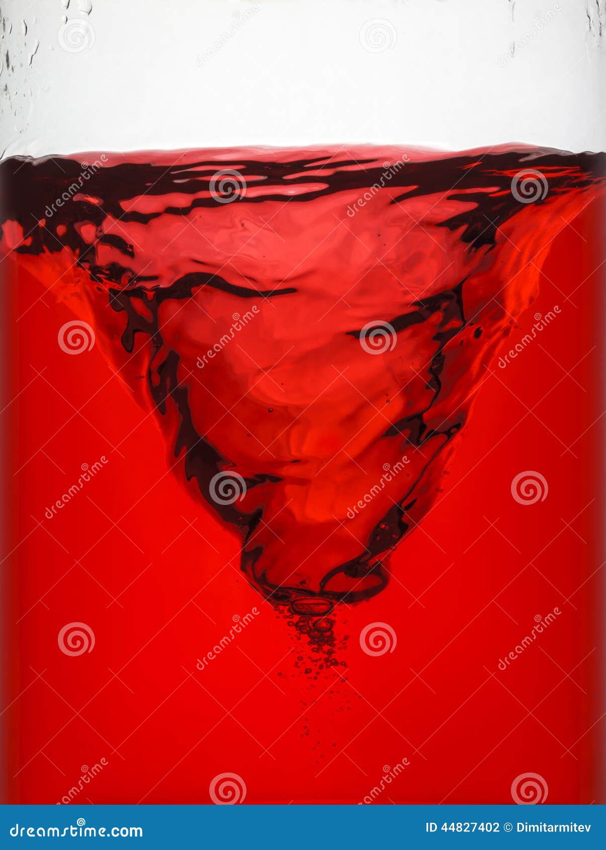 Swirl of Red Liquid Small Typhoon Stock Photo - Image of macro, cream ...