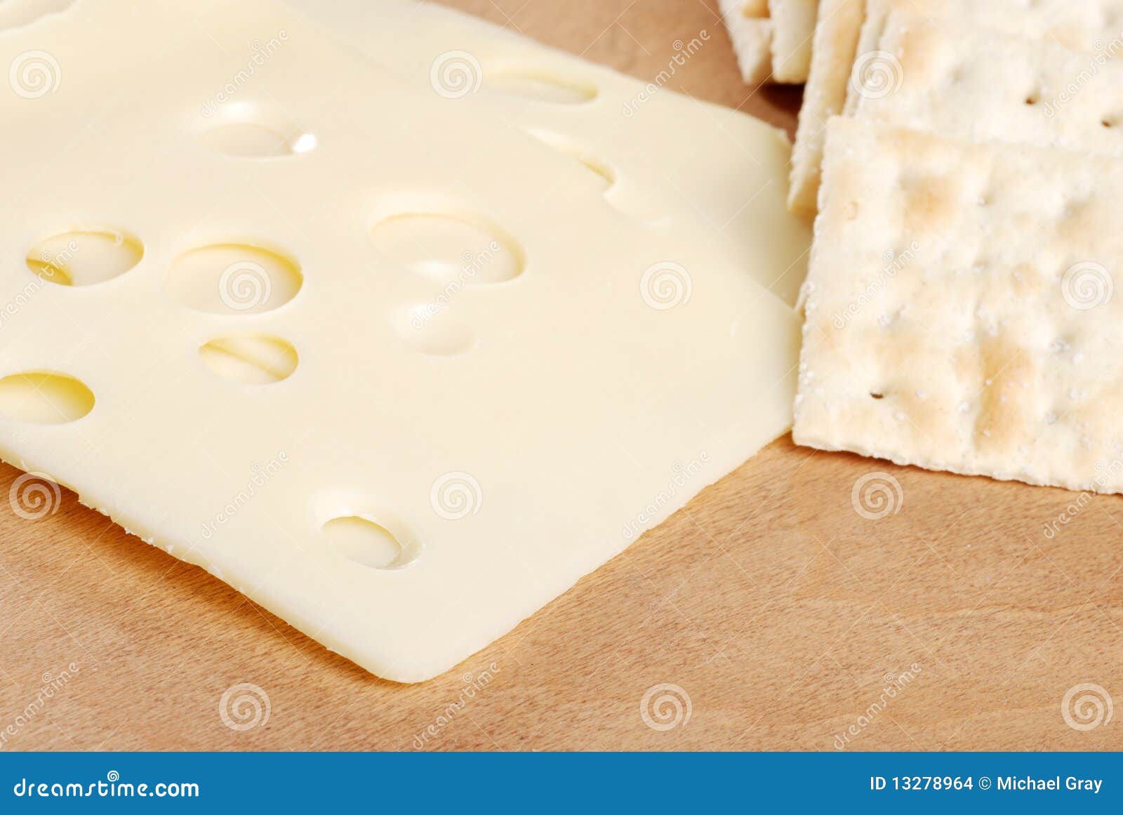Swiss cheese and crackers stock photo. Image of board - 13278964
