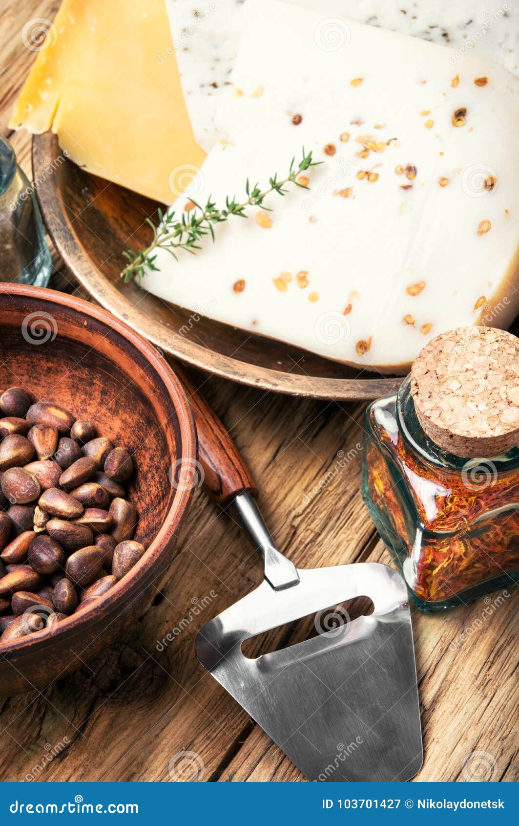 Swiss Cheese with Pine Nuts Stock Image - Image of portion, rustic ...