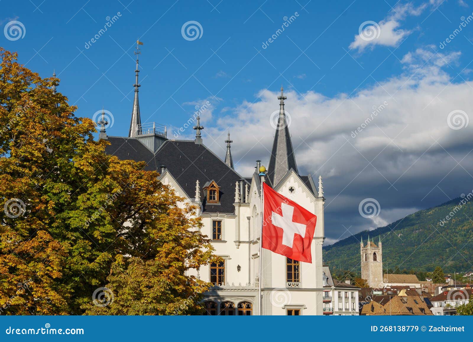 Swiss Flag in Front of Historic Building and Tree with Autumn Leaves ...