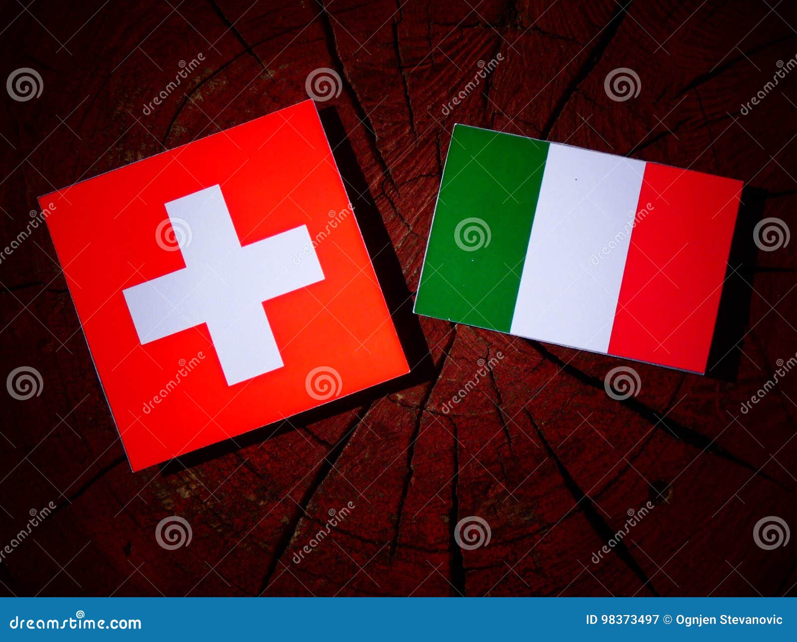 Swiss Flag with Italian Flag on a Tree Stump Isolated Stock ...