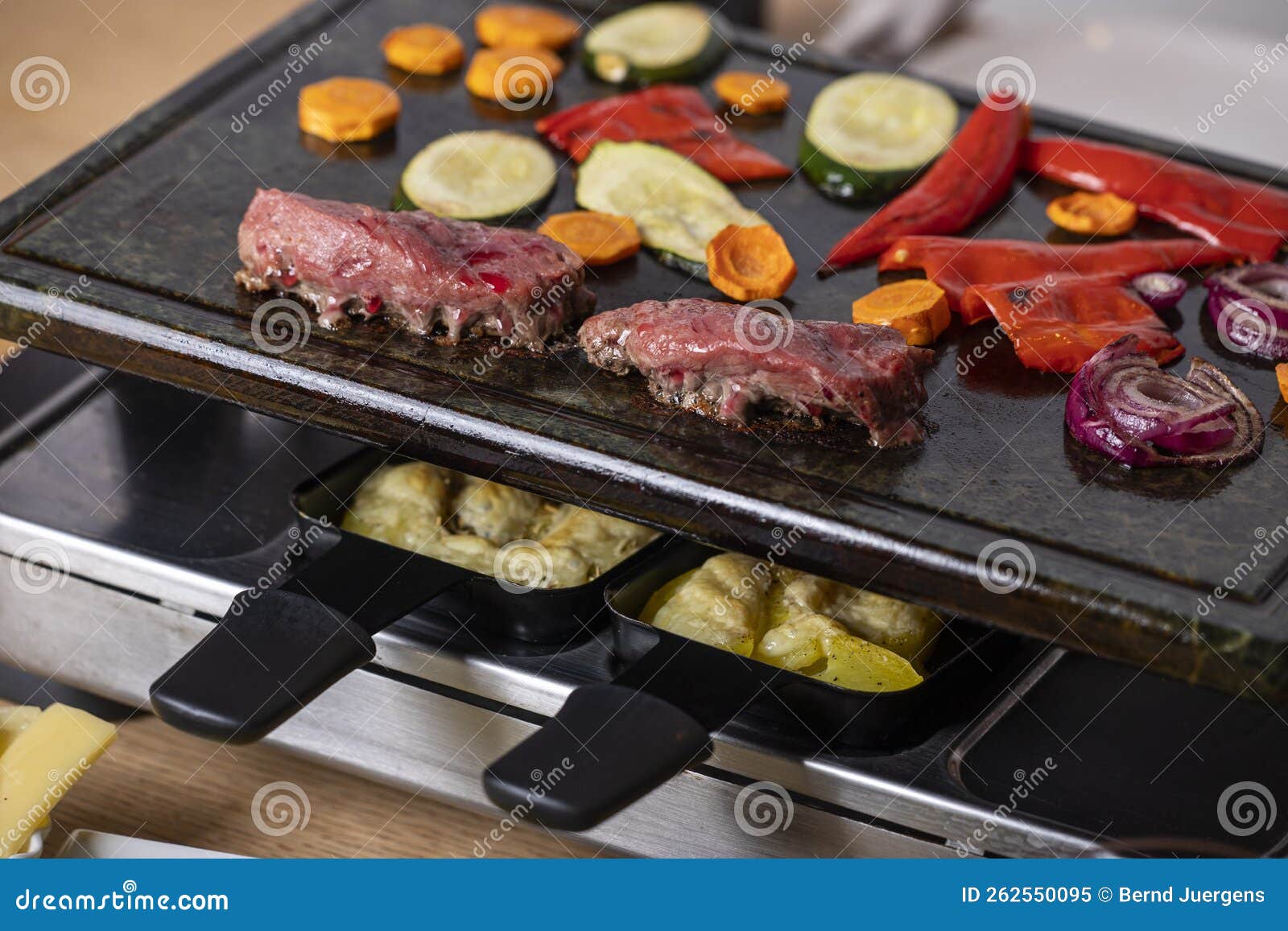 Swiss raclette stock image. Image of boiled, cooking - 262550095