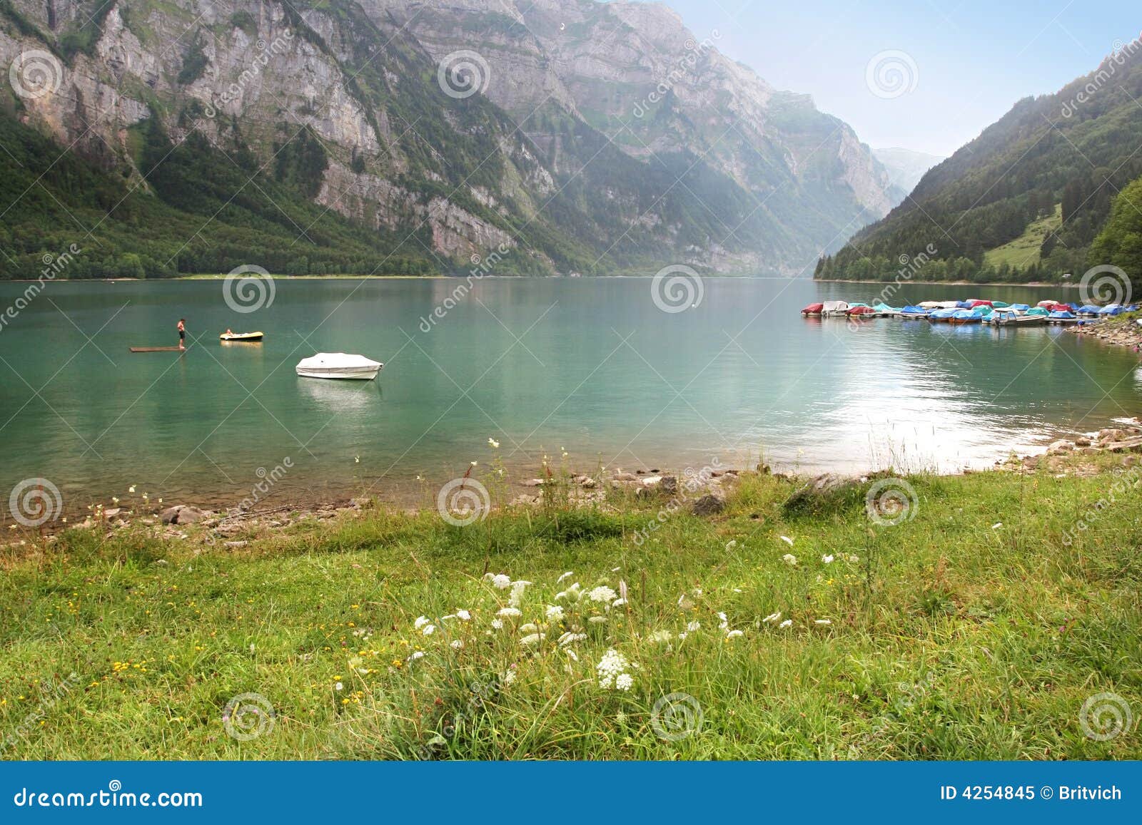 Swiss spring lake stock image. Image of cloudy, landscape - 4254845