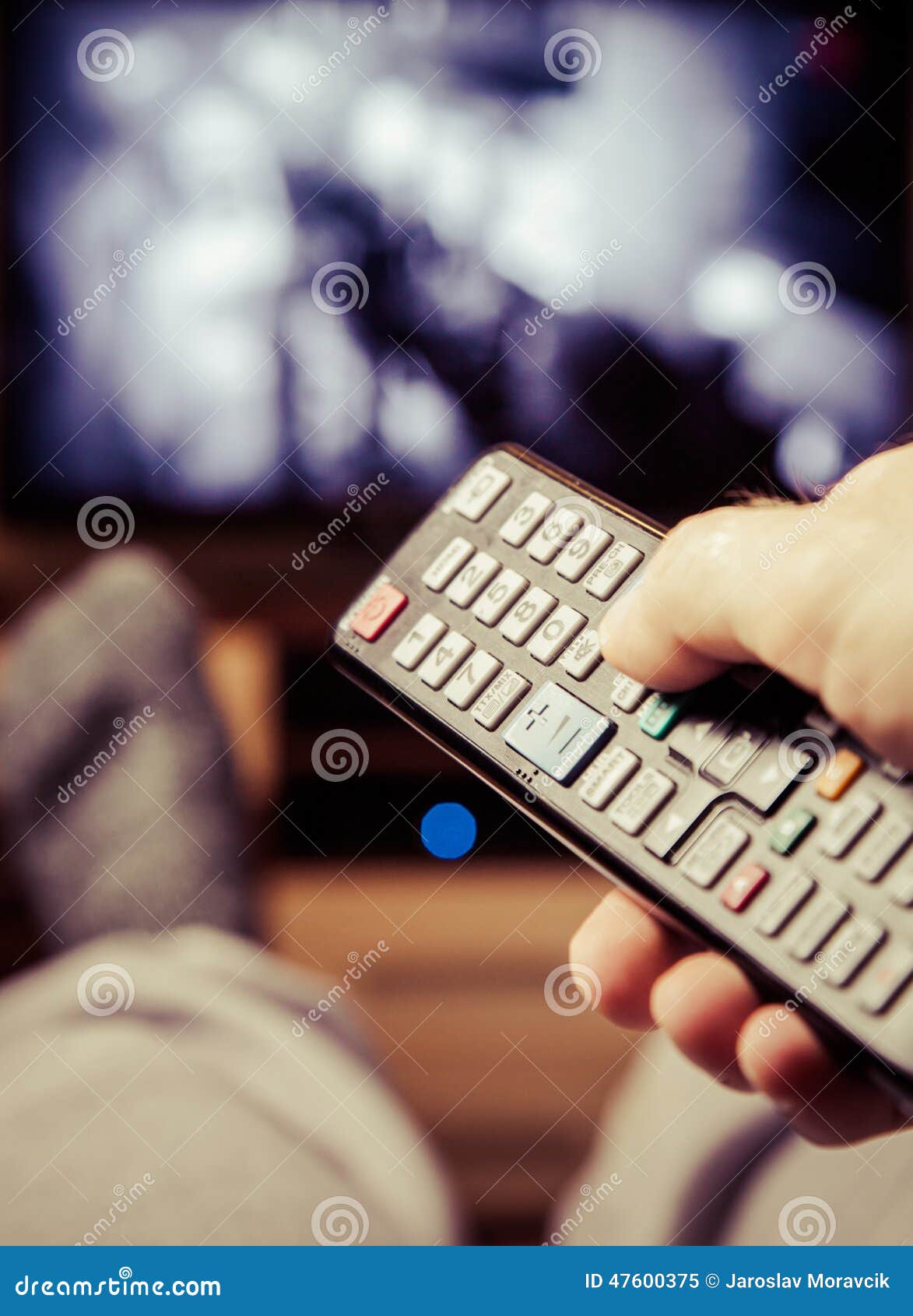 Switching TV channels stock image. Image of living, control - 47600375
